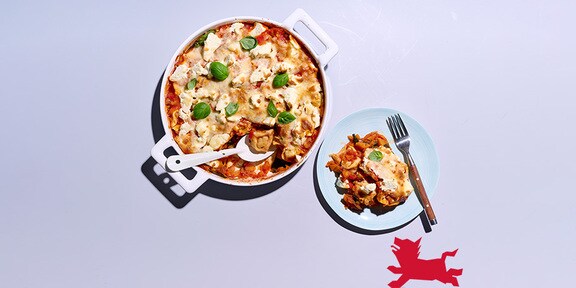 Pasticcio van tortelloni met pompoen, ricotta en spinazie